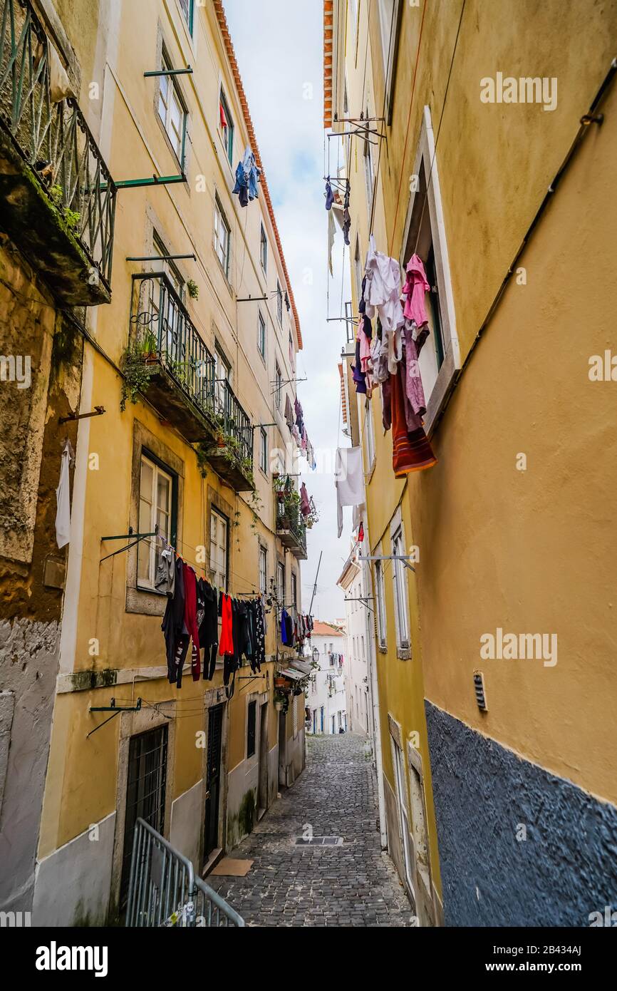 Narrow streets of lisbon’s alfama hi-res stock photography and images ...