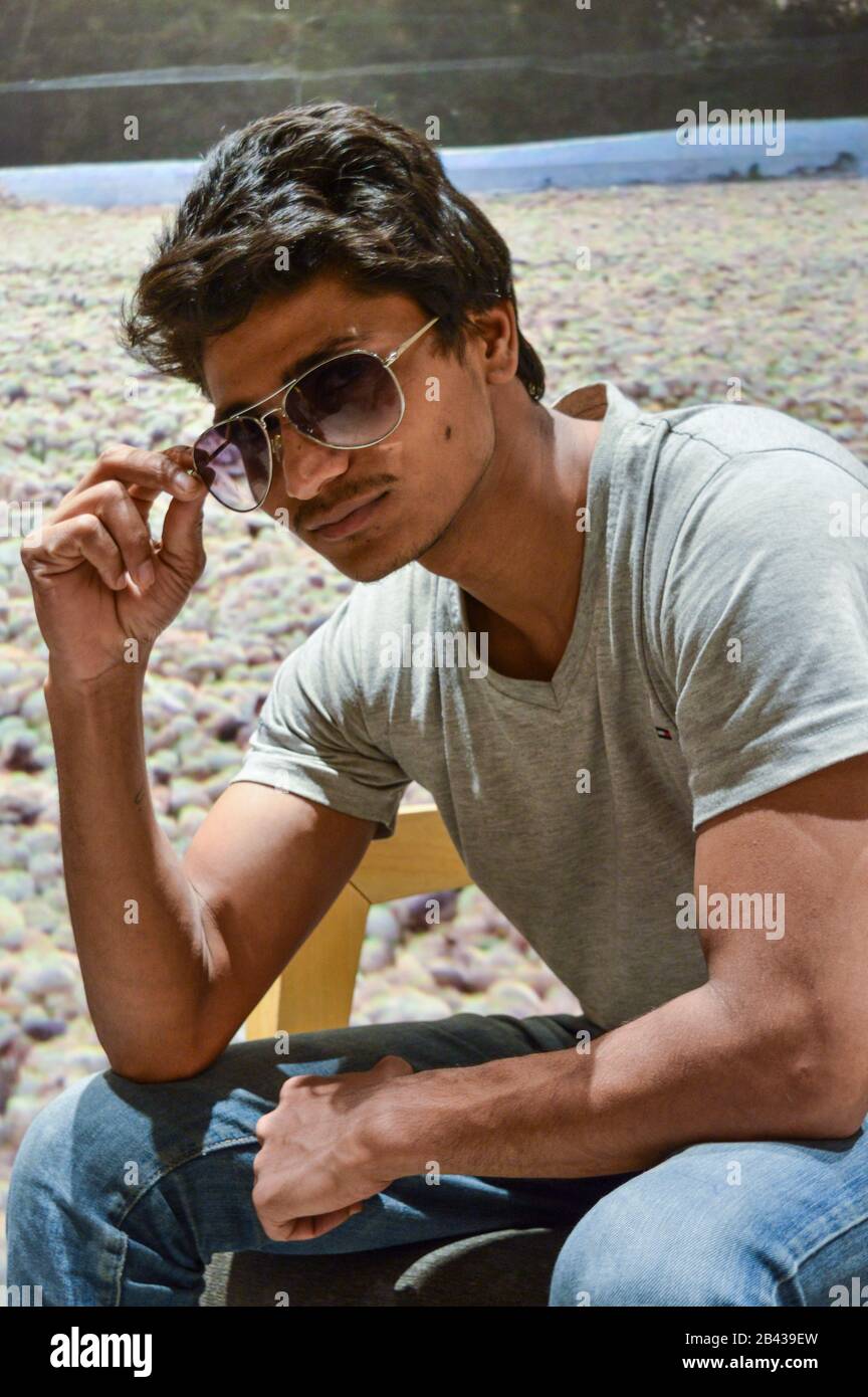 A indian boy poses for portfolio shoot at studio Stock Photo - Alamy
