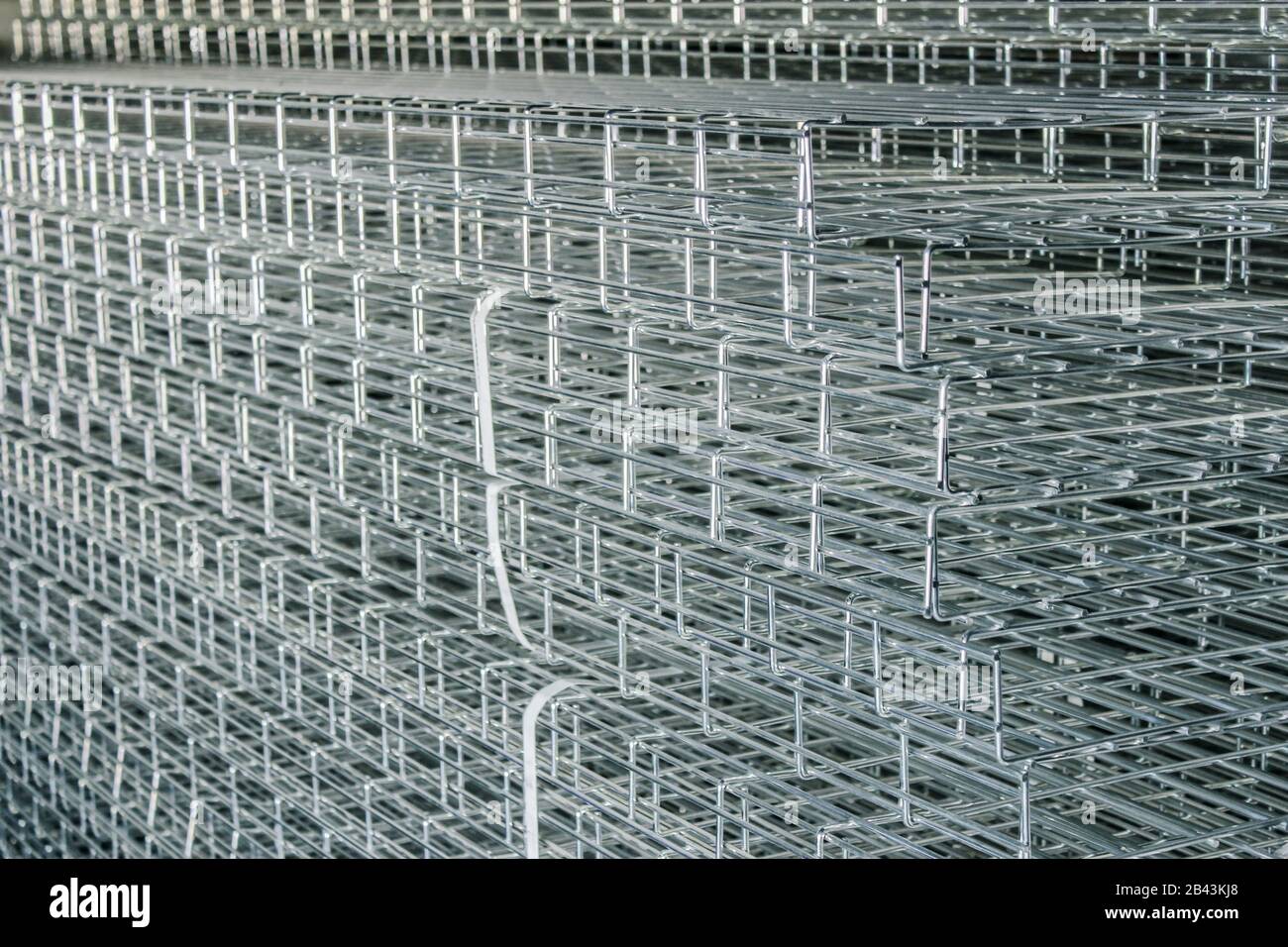 Wire cable trays stacked in a stack Stock Photo - Alamy