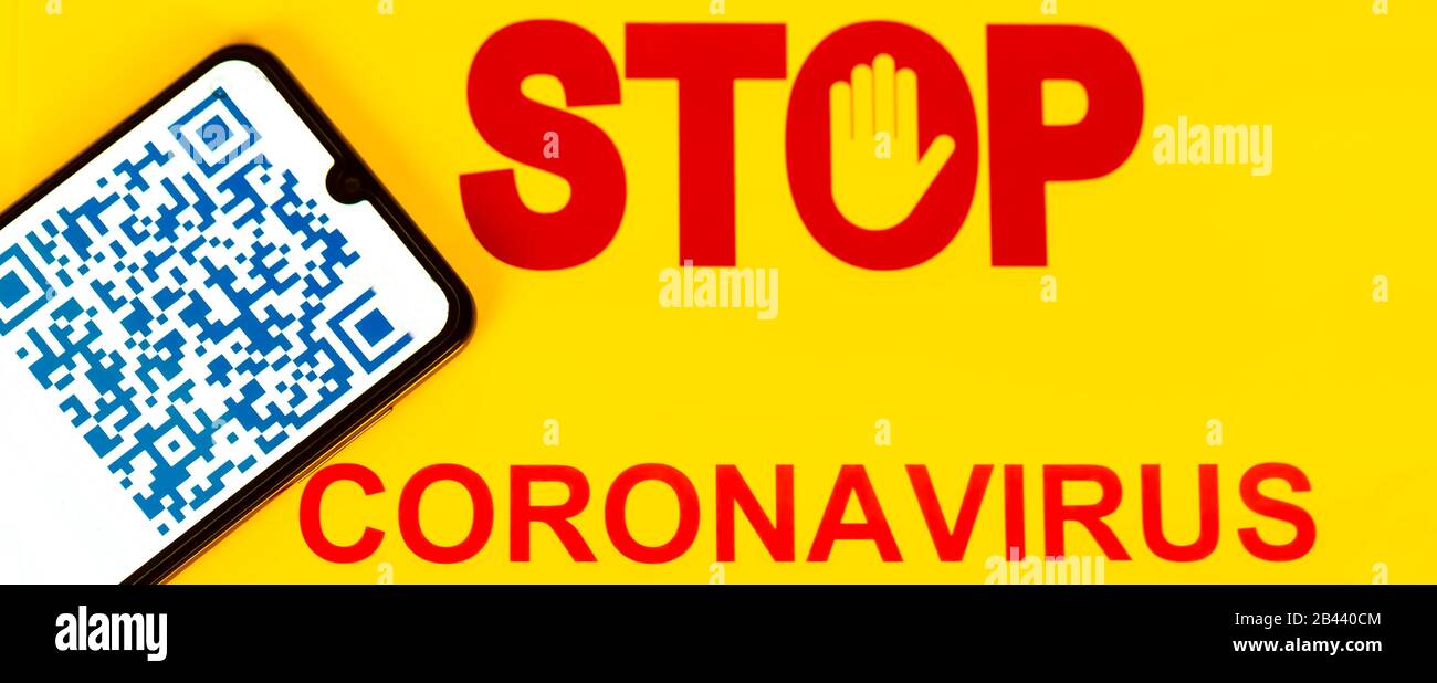 STOP Sign with blue colorful QR Code on smart phone screen for ...