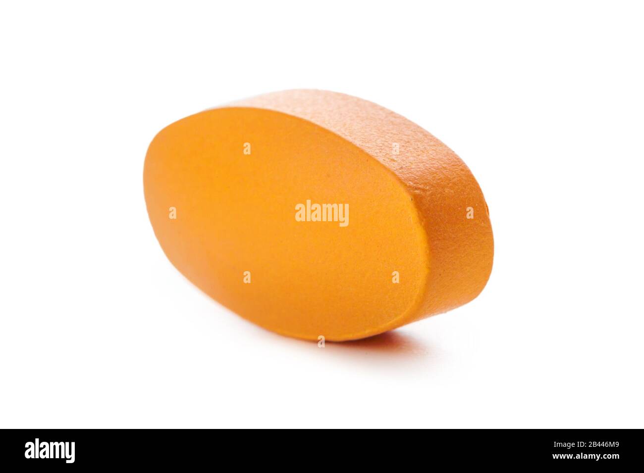 yellow vitamin pills isolated on white background Stock Photo - Alamy