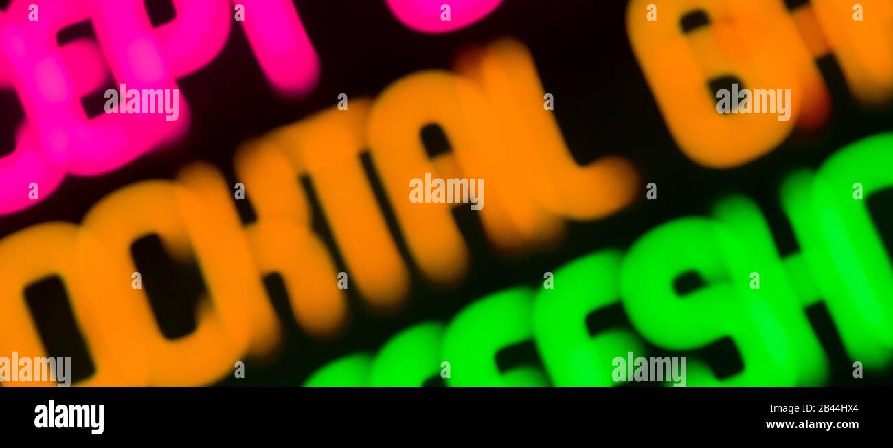 Neon background. Neon signs and words of different colors at night on ...