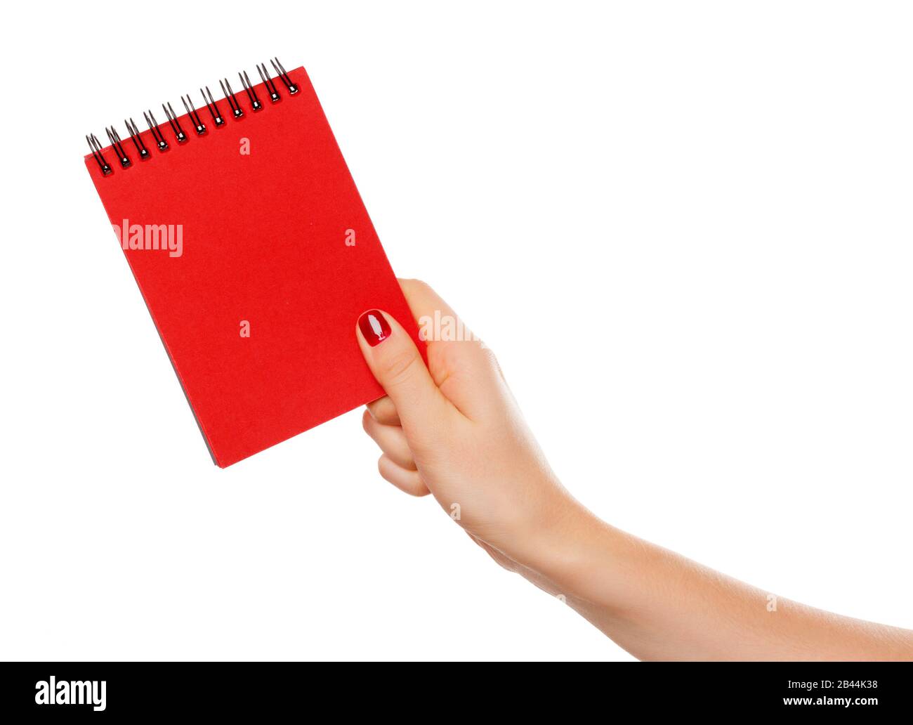Notebook in hand. Isolated on white background Stock Photo - Alamy