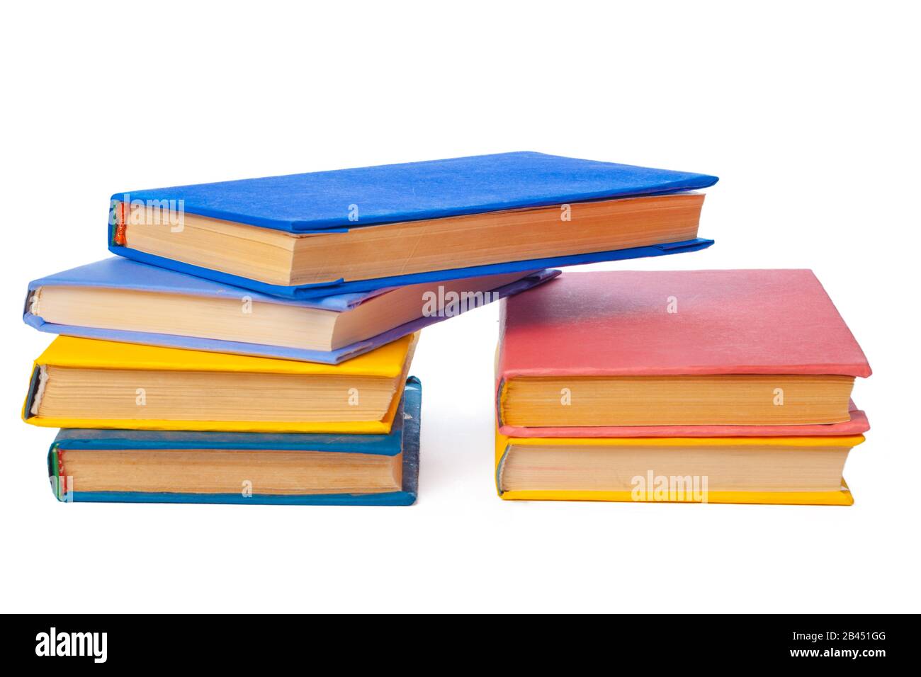 pile of books isolated on white background Stock Photo - Alamy