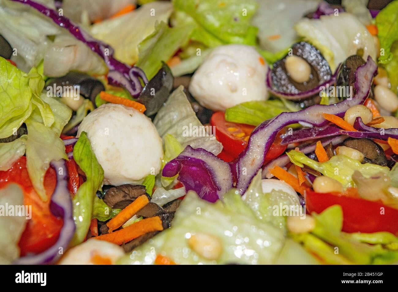 Vegetable salad with mozzarella. Surface texture. Close up Stock Photo ...