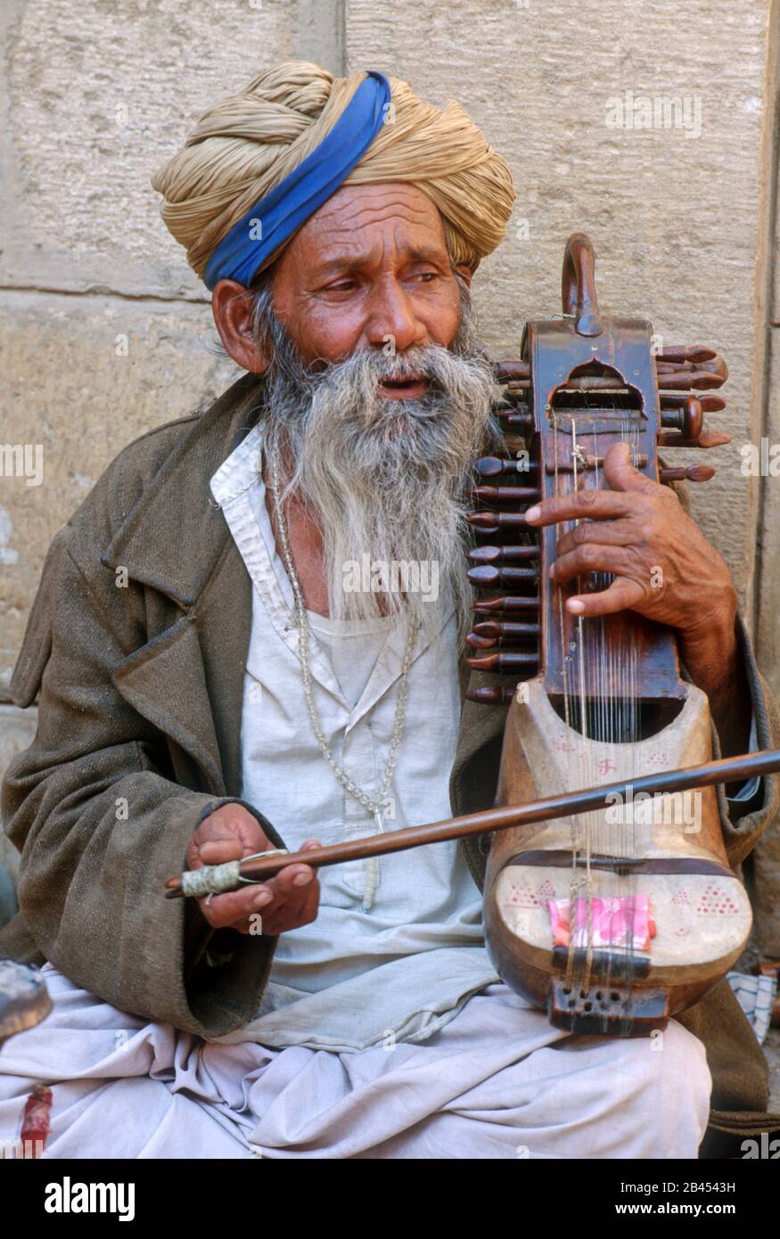 Man playing sarangi in patwon ki haveli jaisalmer at rajasthan, India ...