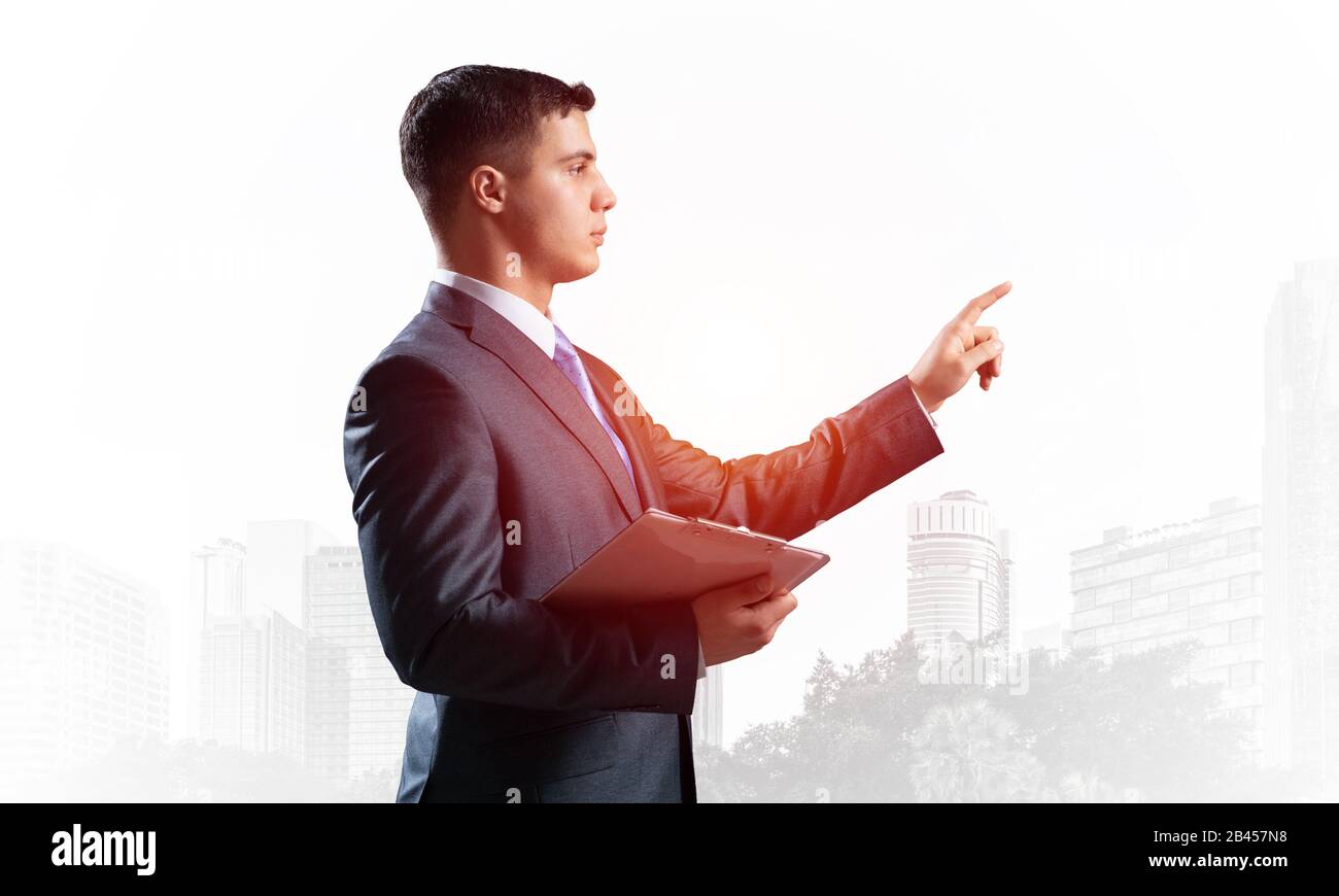 Side view of man in business suit and tie Stock Photo - Alamy