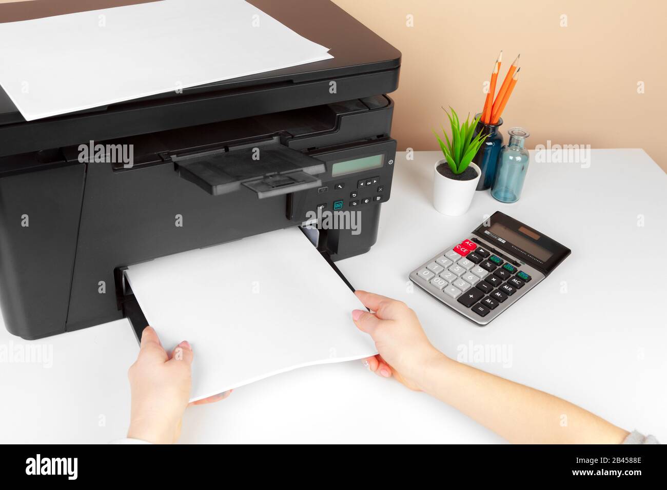 Woman photocopy machine hi-res stock photography and images - Alamy