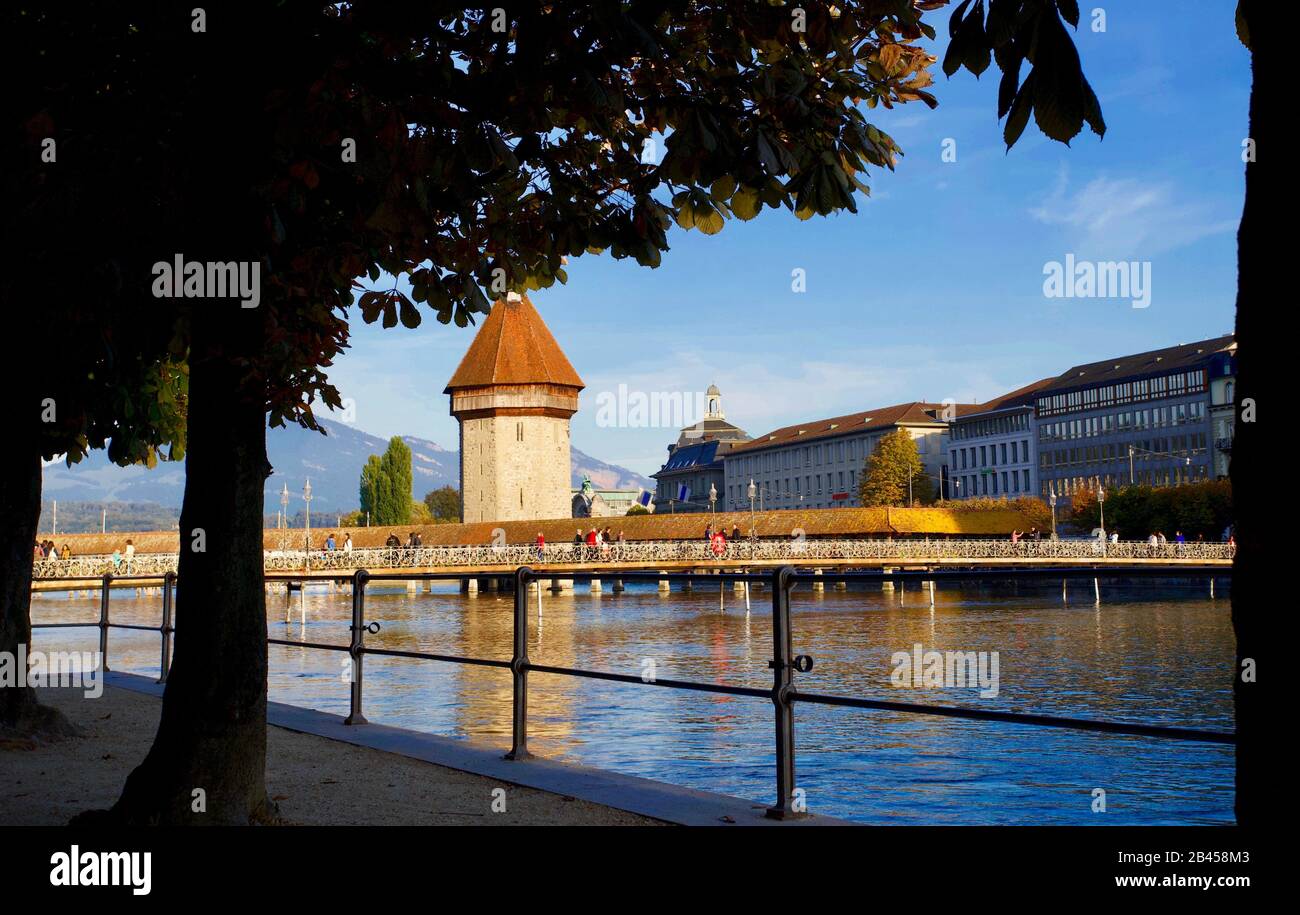 View of the Reuss River, Water Tower & Rathaussteg & Chapel Bridges ...