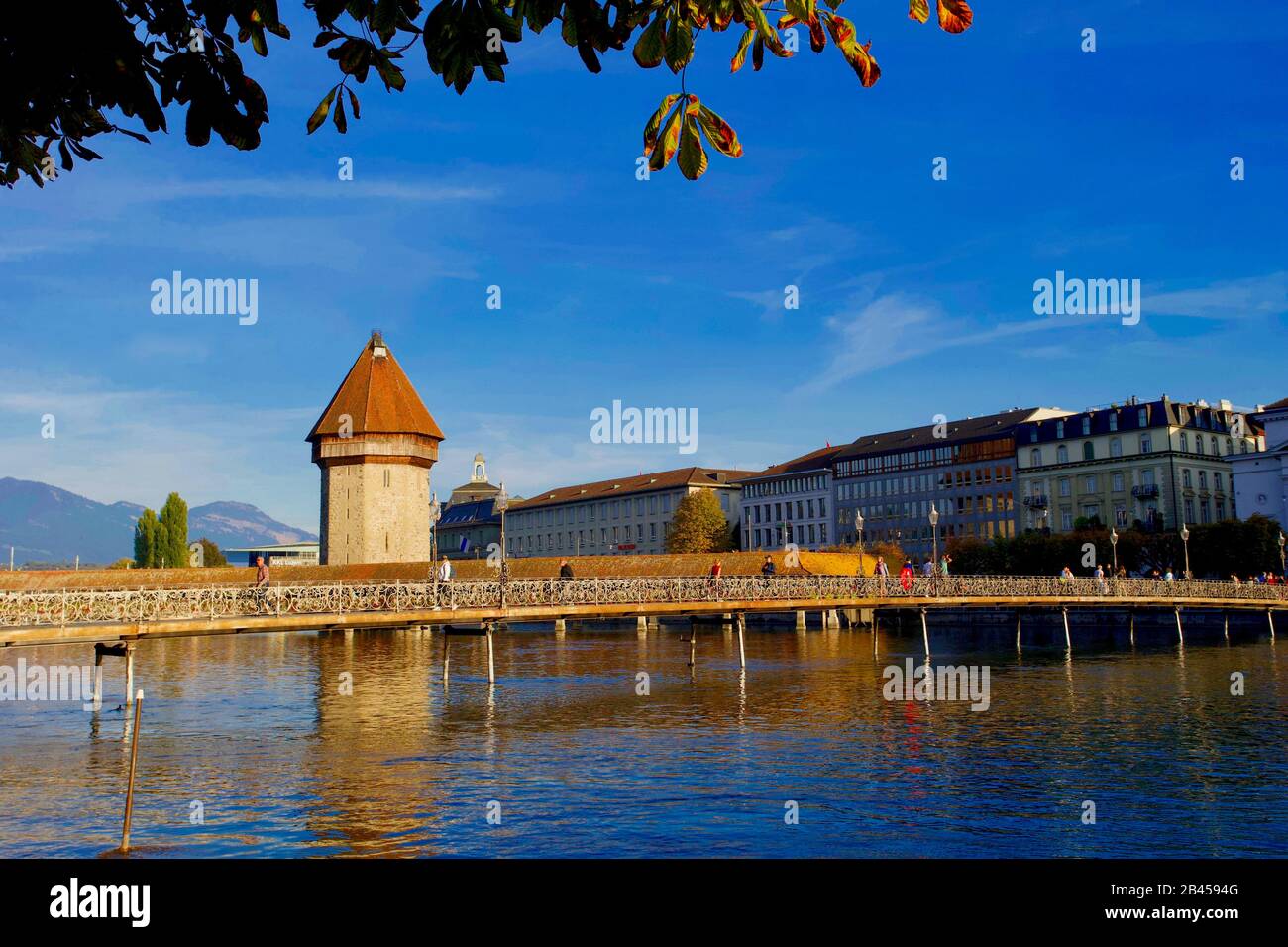 View of the Reuss River, Water Tower & Rathaussteg & Chapel Bridges ...
