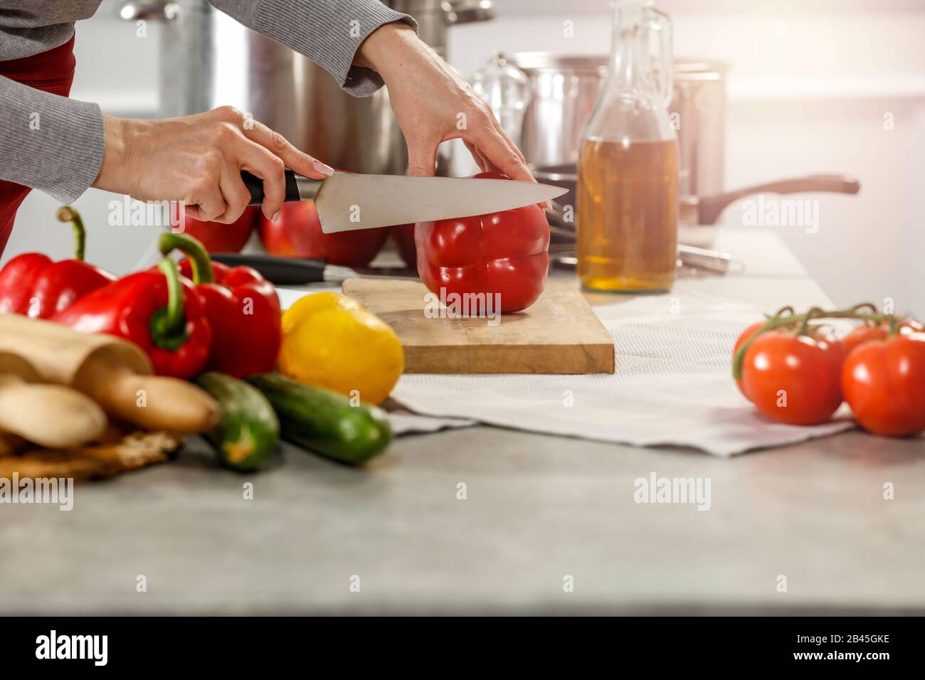 Cooking, baking and preparing meals and dishes in the kitchen. Table ...