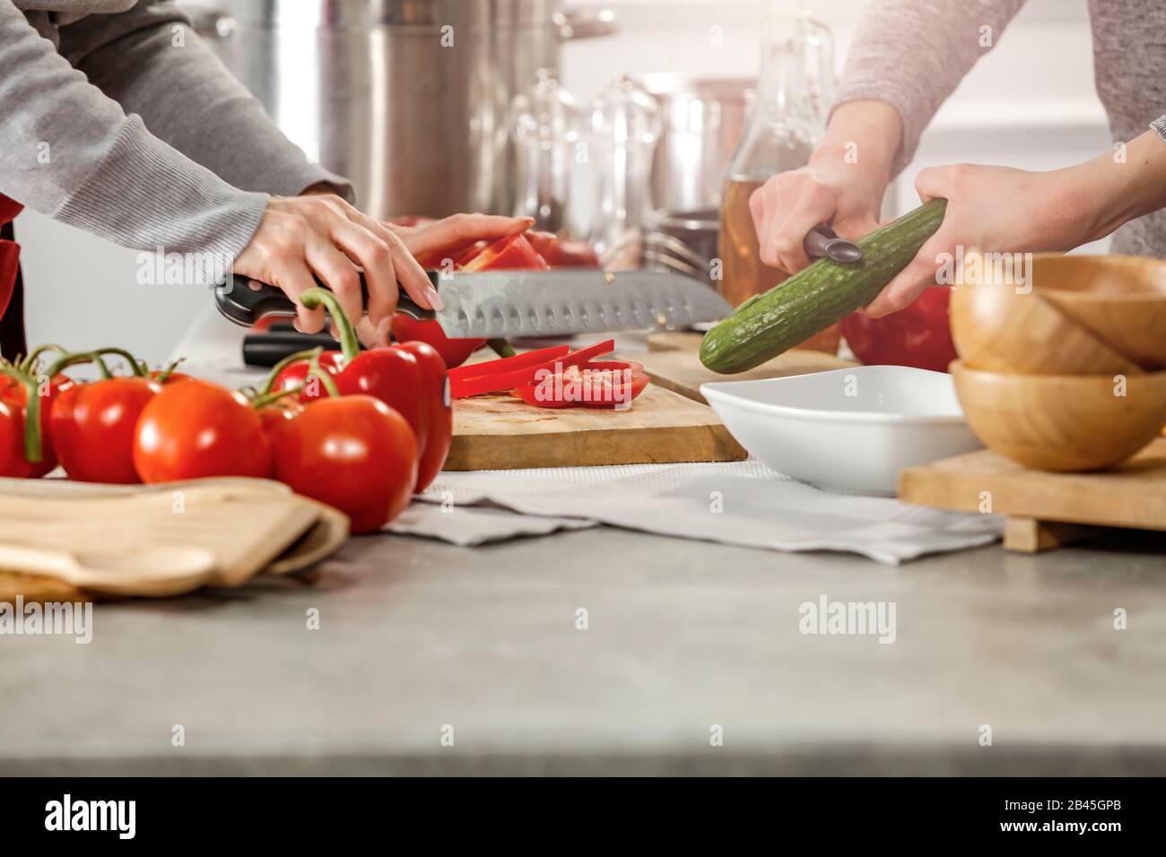 Cooking, baking and preparing meals and dishes in the kitchen. Table ...