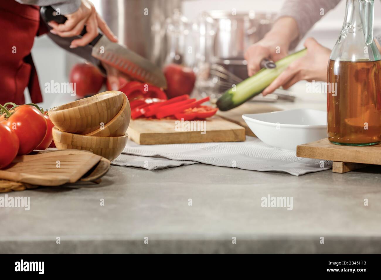 Cooking, baking and preparing meals and dishes in the kitchen. Table ...
