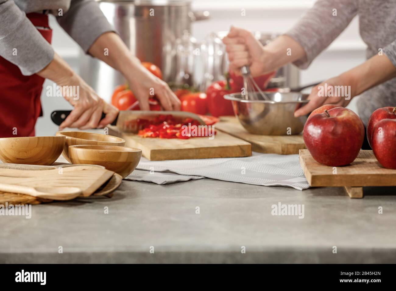 Cooking, baking and preparing meals and dishes in the kitchen. Table ...