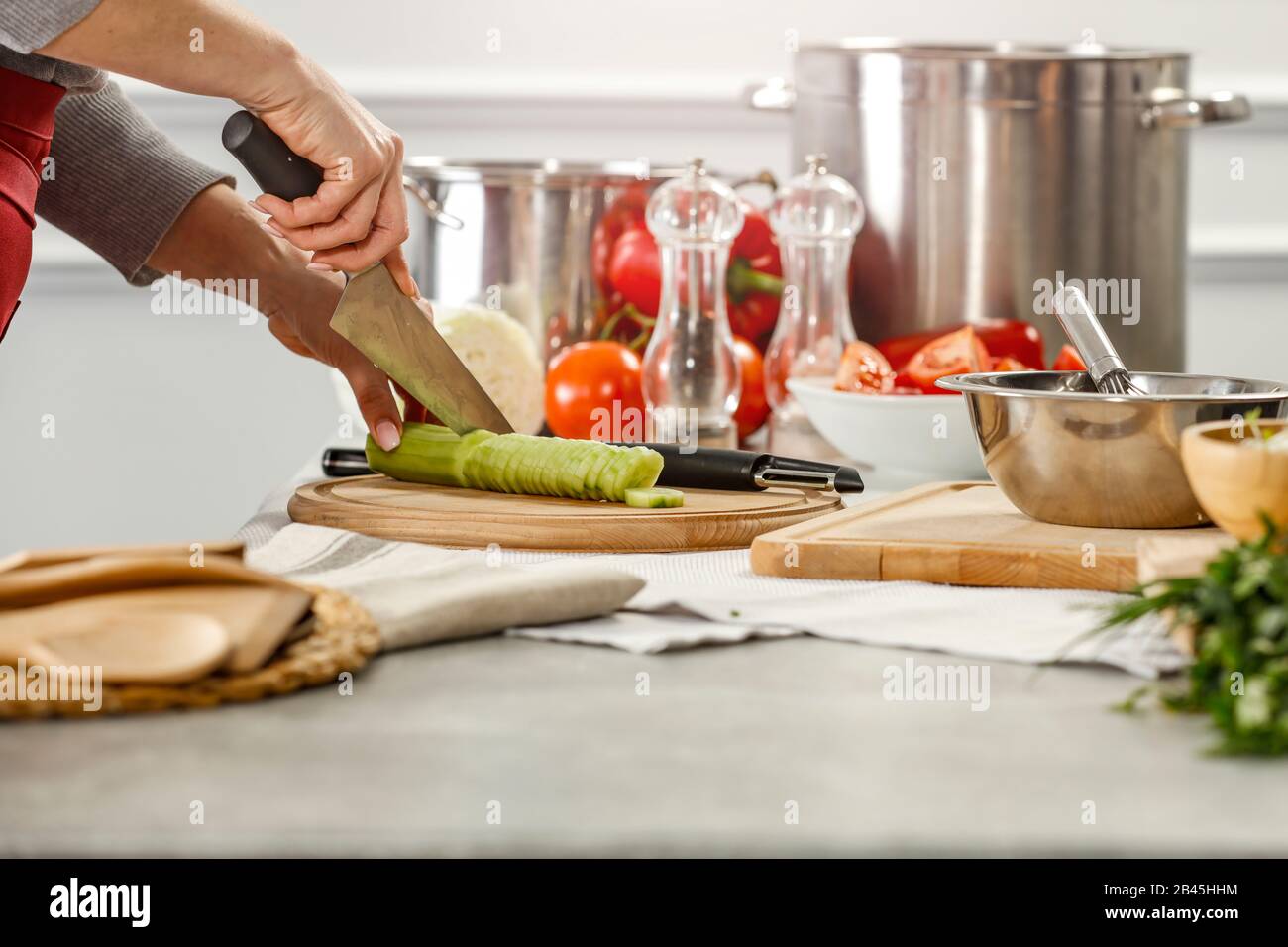 Cooking, baking and preparing meals and dishes in the kitchen. Table ...