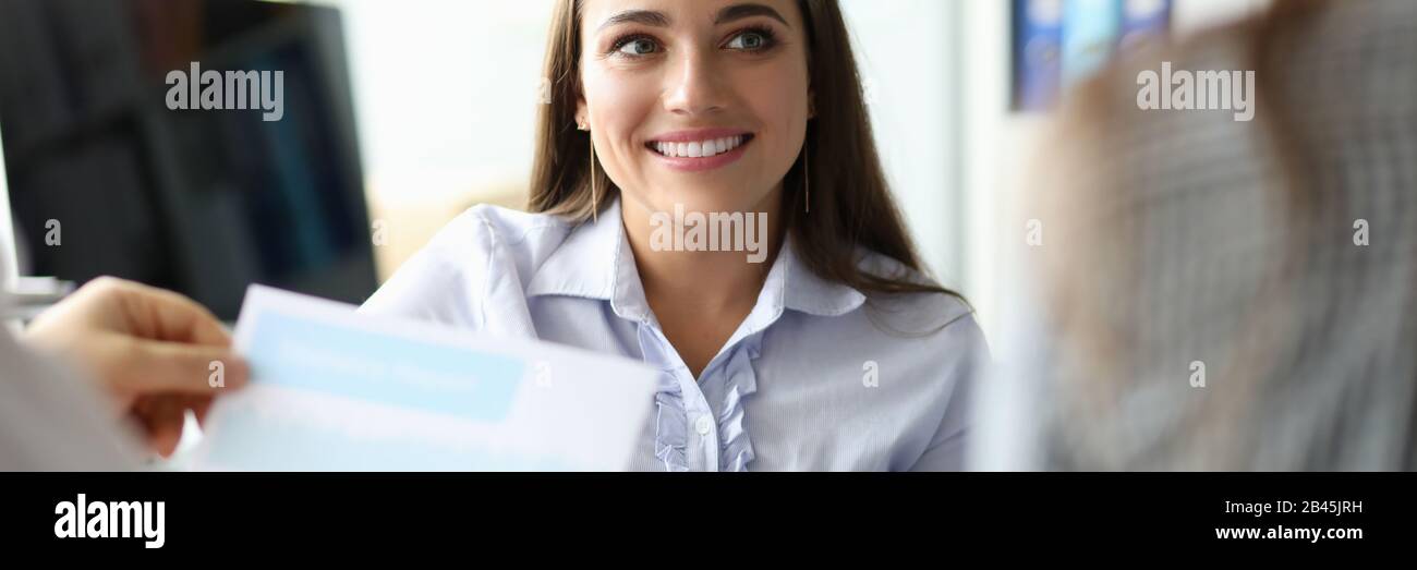Cheerful colleague at workplace Stock Photo - Alamy