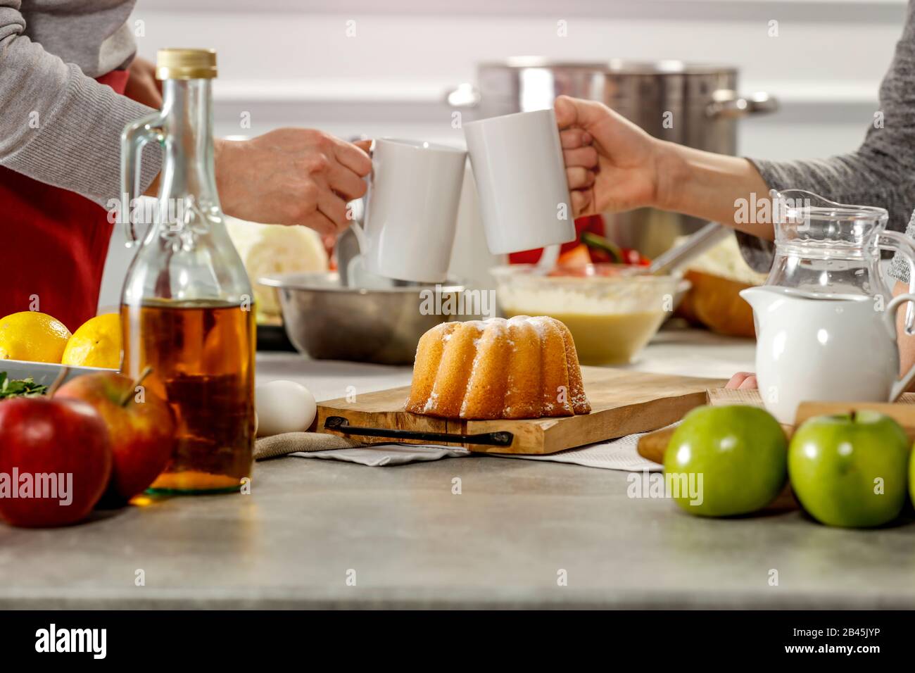 Cooking, baking and preparing meals and dishes in the kitchen. Table ...