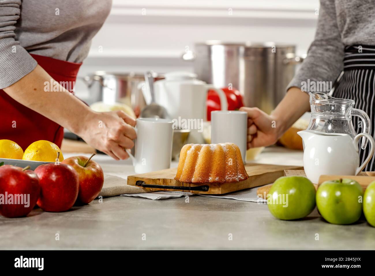 Cooking, baking and preparing meals and dishes in the kitchen. Table ...
