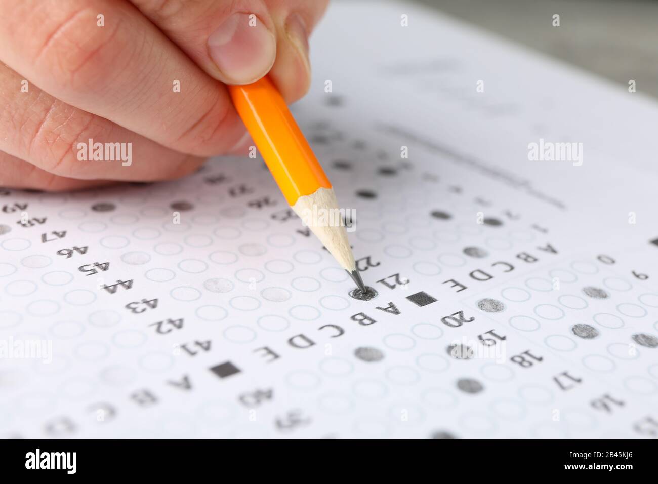 Student fills answers test sheet, close up Stock Photo - Alamy