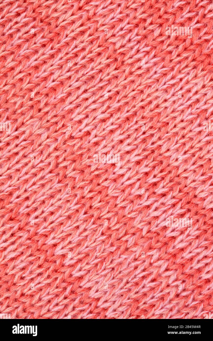 Pink - Peach knitted textured background Stock Photo - Alamy