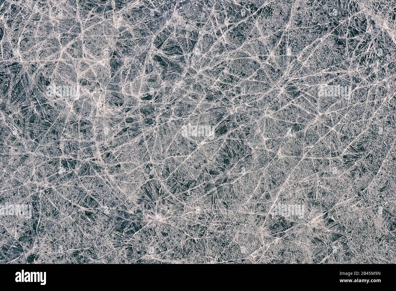 texture cracked ice puddle form plexus web. season spring autumn. macro ...