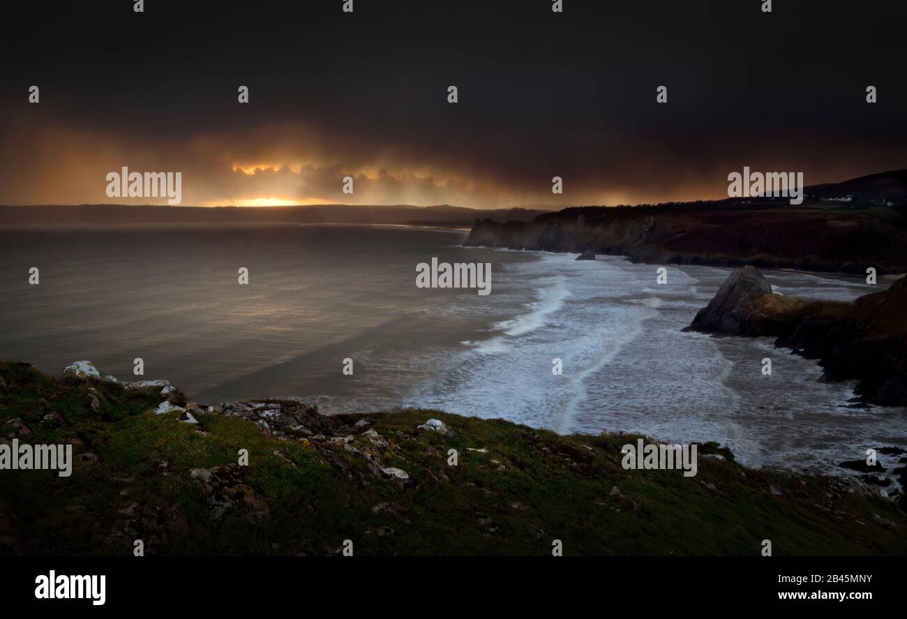 Storm clouds at sunset Stock Photo - Alamy