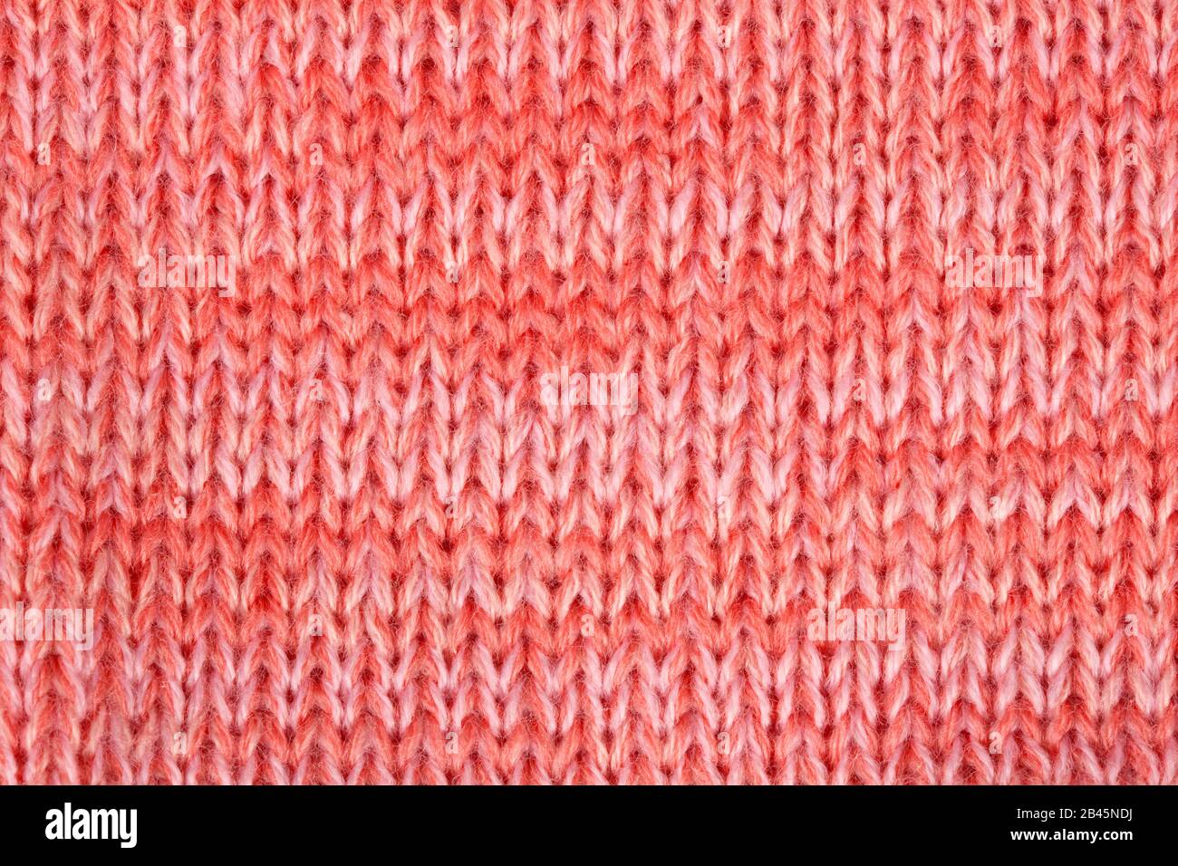 Pink - Peach knitted textured background Stock Photo - Alamy