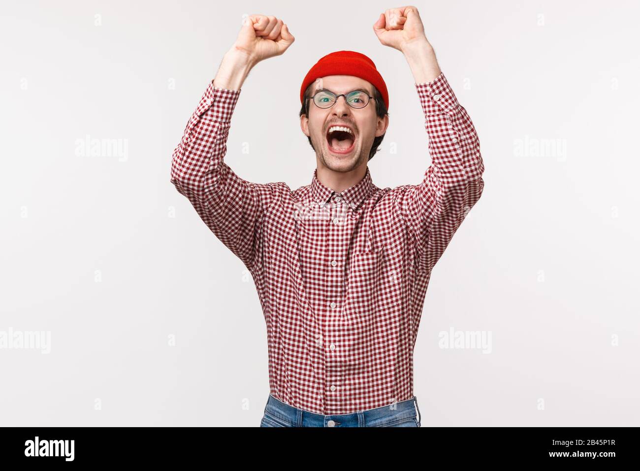 Waist-up portrait of excited and thrilled happy relieved man winning ...