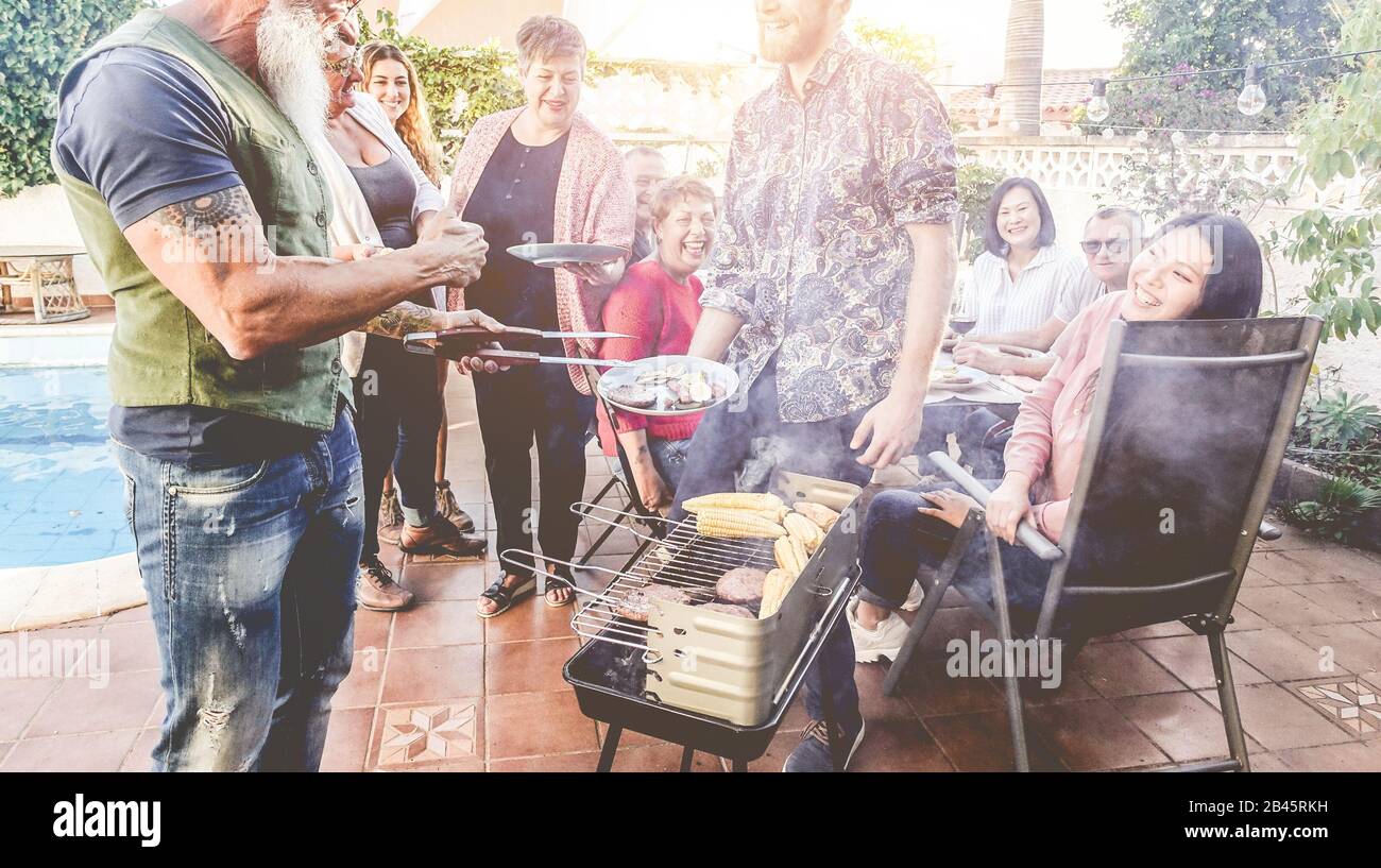 Family outdoor cooking pool hi-res stock photography and images - Alamy