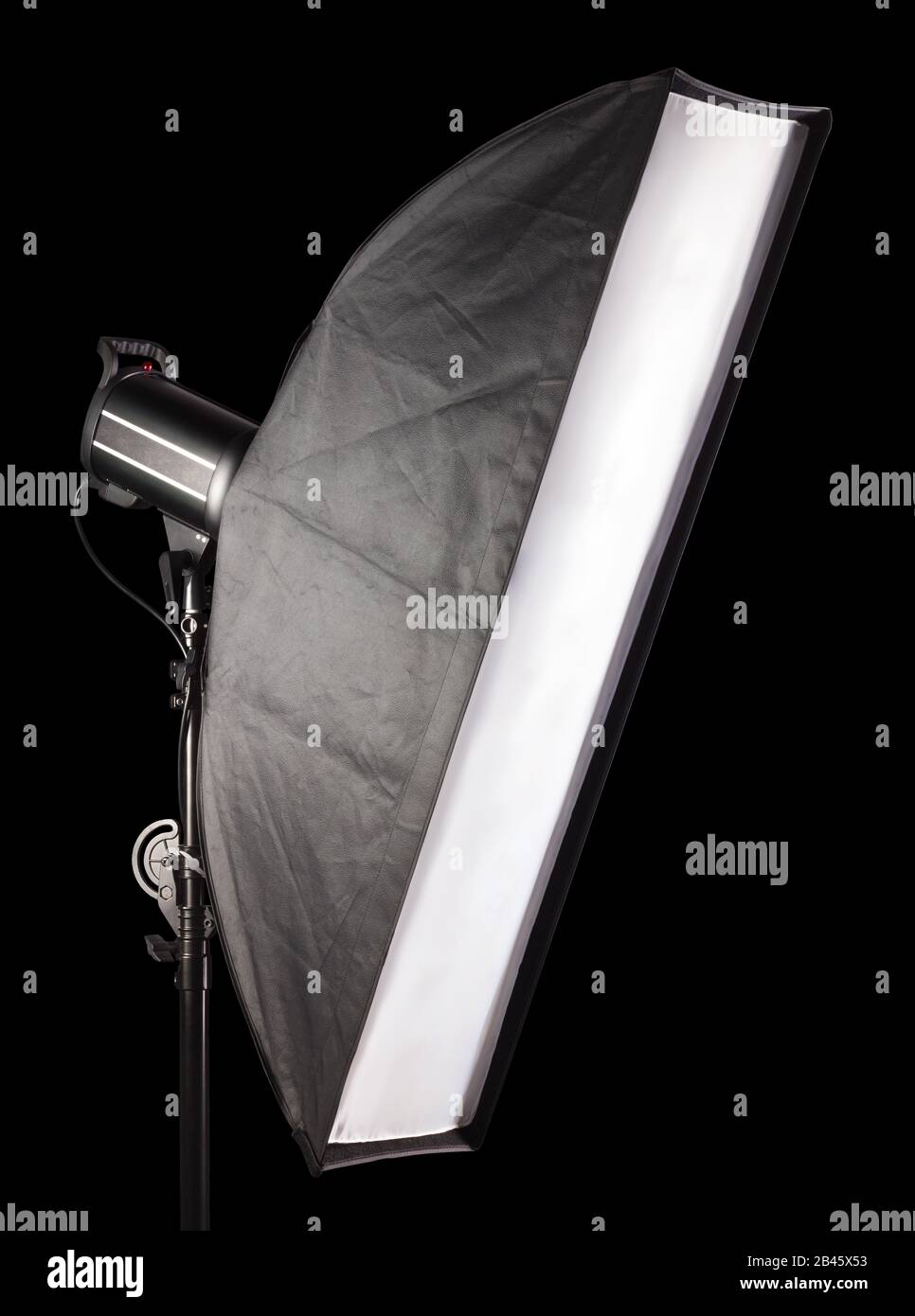 Photography studio flash with softbox isolated on black background with ...