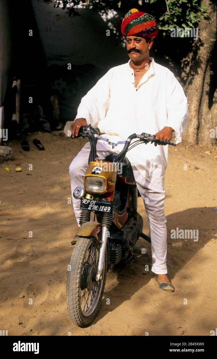Indian farmer riding a motorbike, India, Asia, MR Stock Photo - Alamy