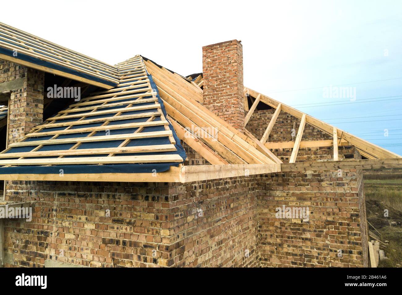 Private residential house with wooden roof frame structure under ...