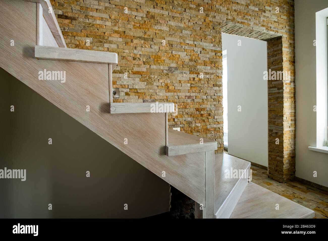 Stylish wooden contemporary staircase inside loft house interior ...
