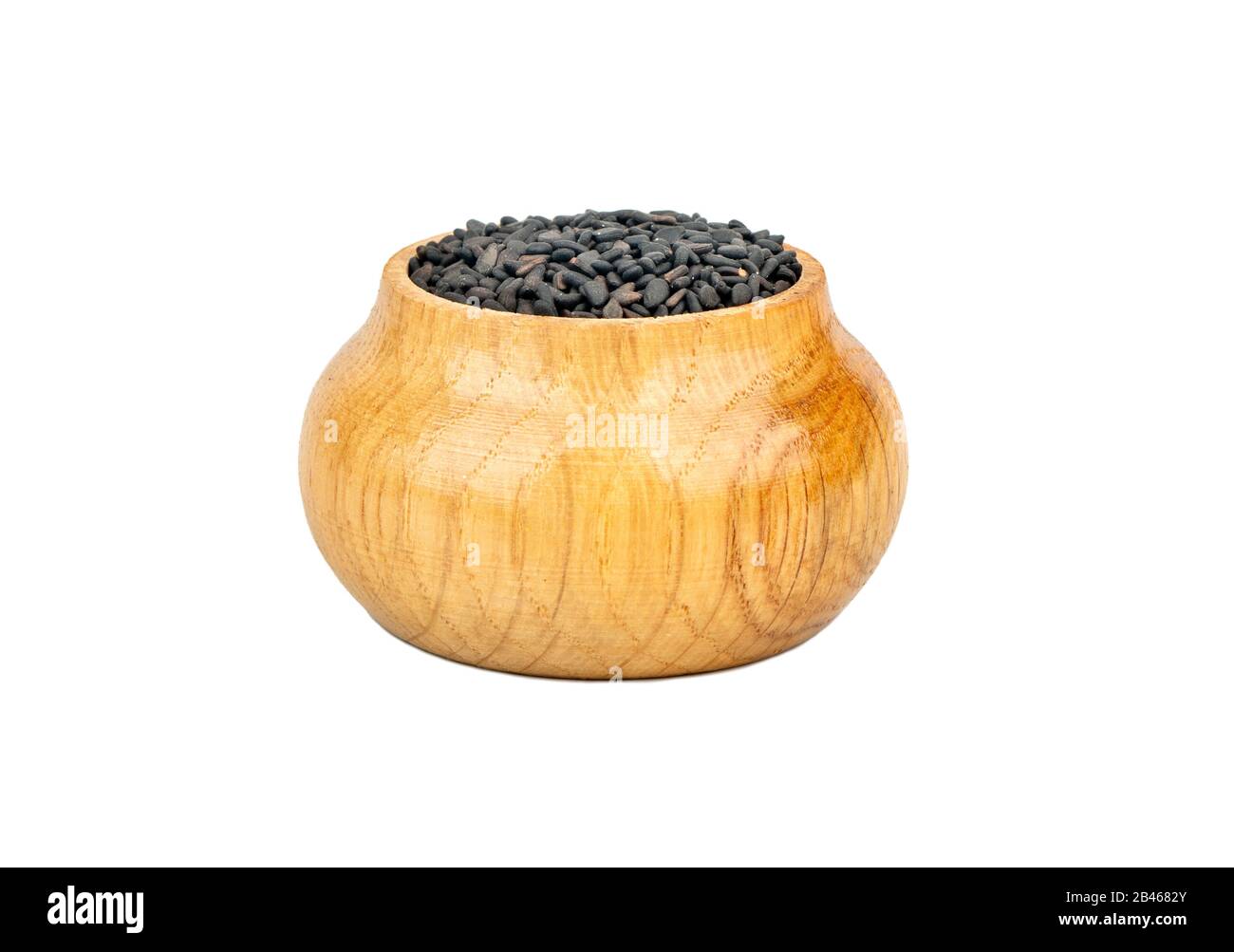 Black sesame in wooden container isolated on white background Stock ...