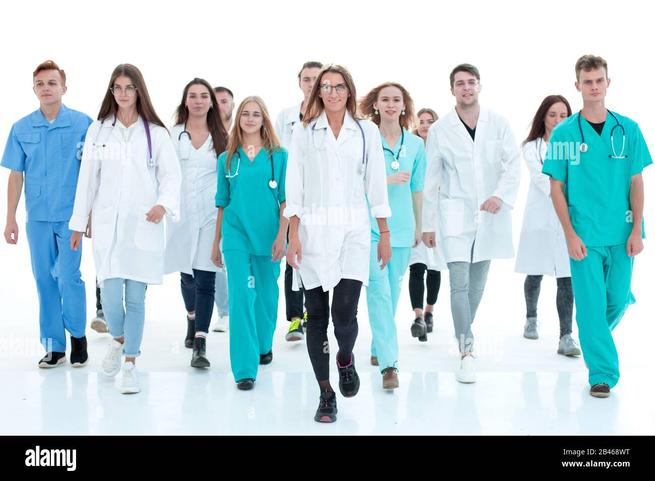 top view. a group of smiling doctors pointing at you Stock Photo - Alamy