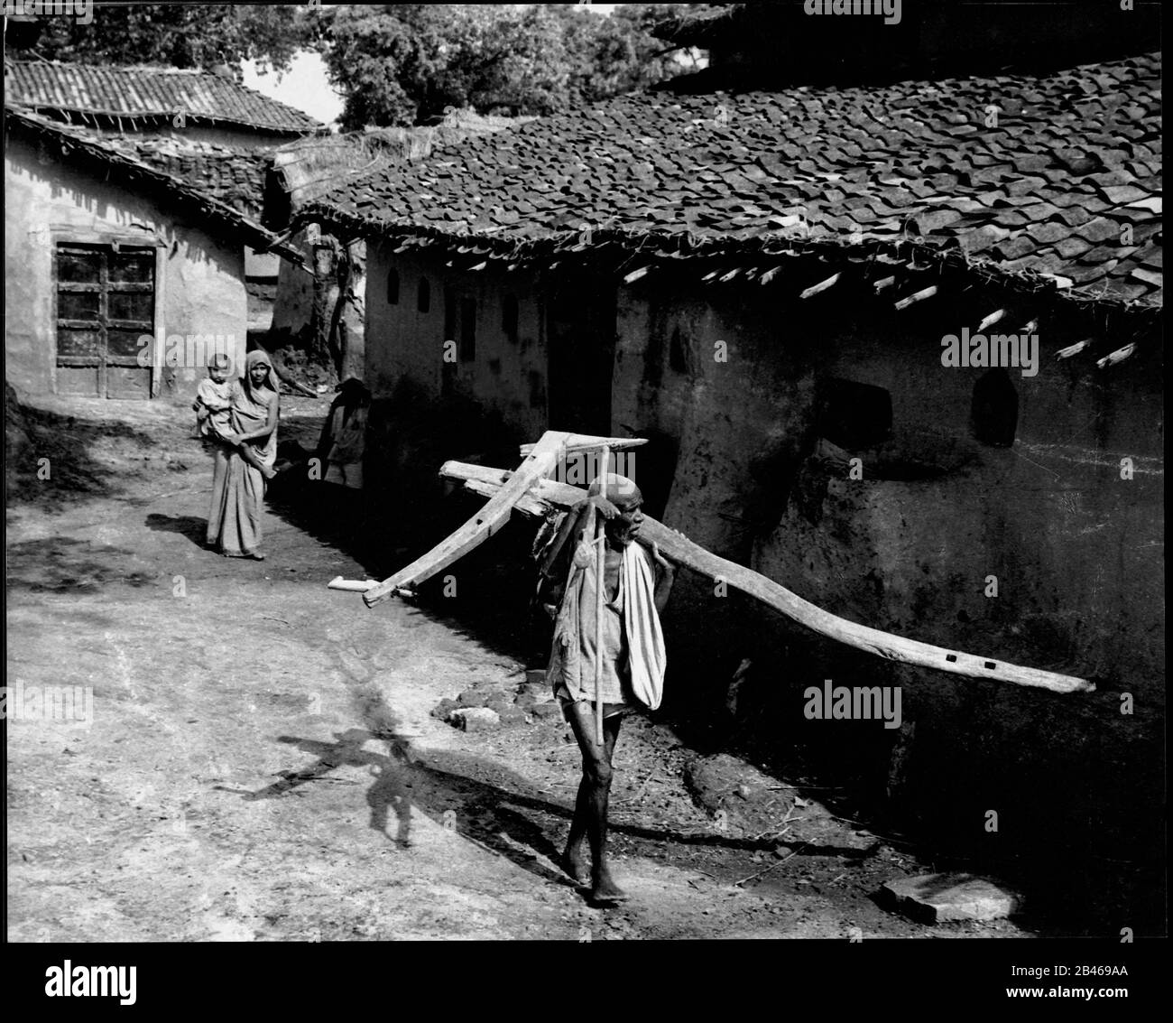 Farmer carrying plough, village street, Uttar Pradesh, India, Asia ...