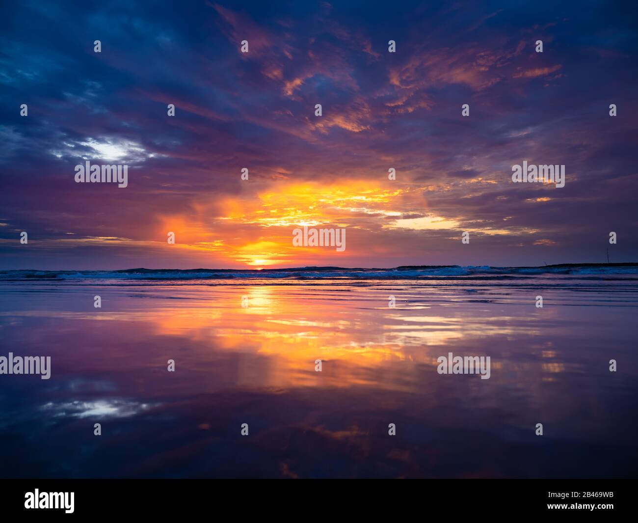 Sunset at Kuta beach in Bali Indonesia Stock Photo - Alamy
