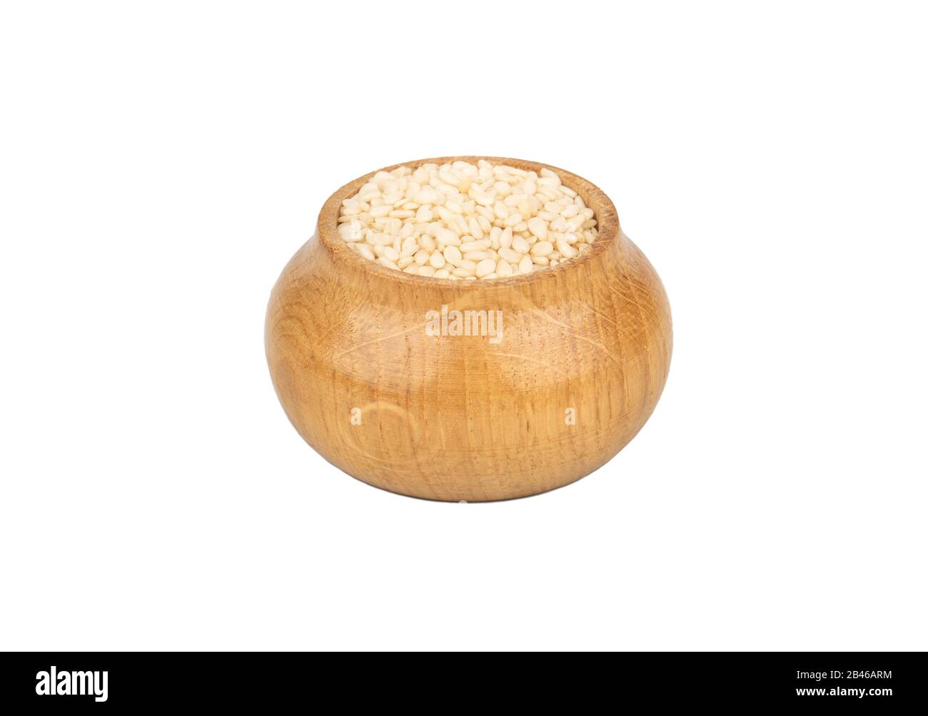 Sesame seeds in wooden container isolated on white background Stock ...