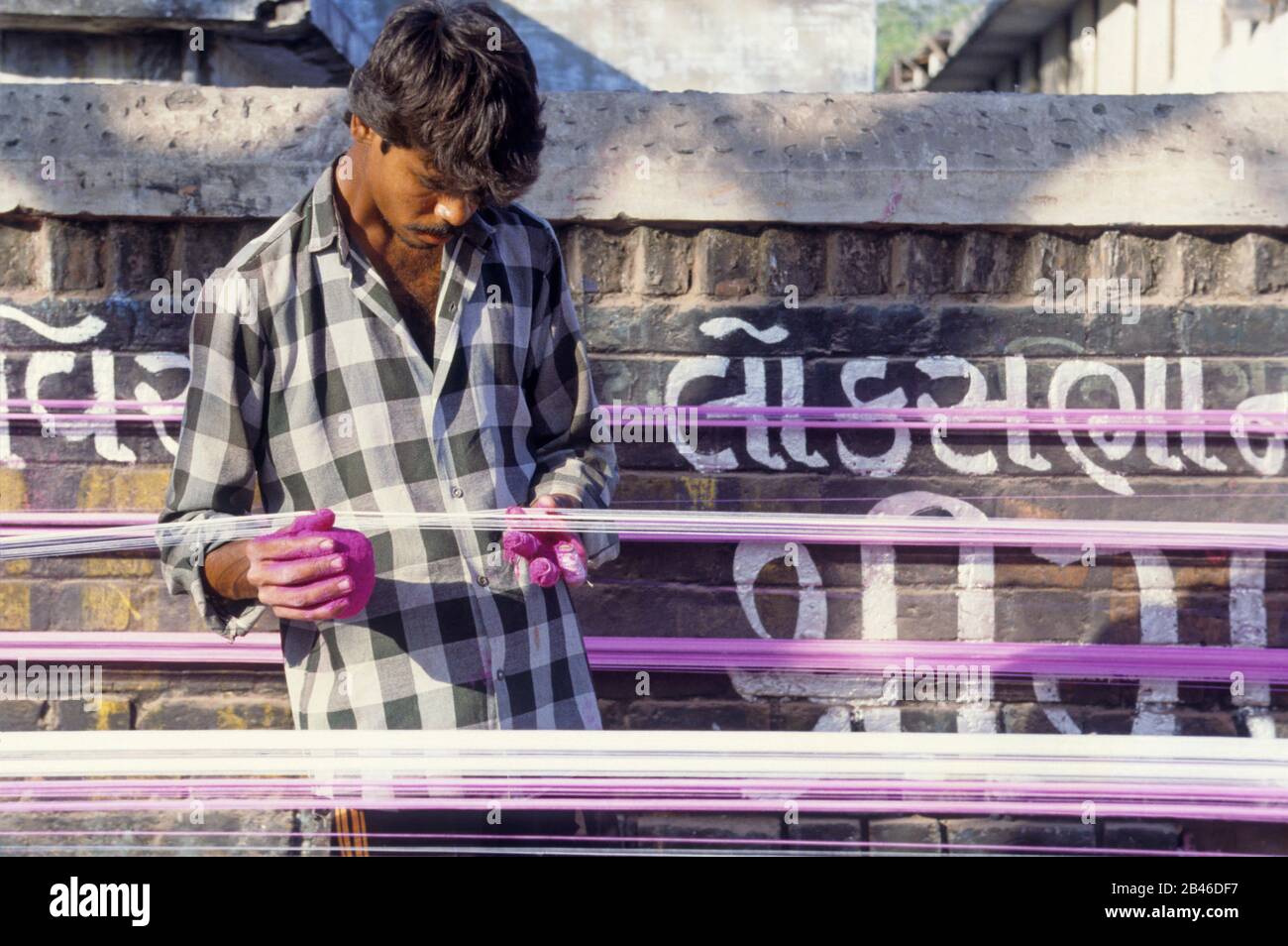 Kite festival, Uttarayan, applying glass powder on thread, Ahmedabad ...