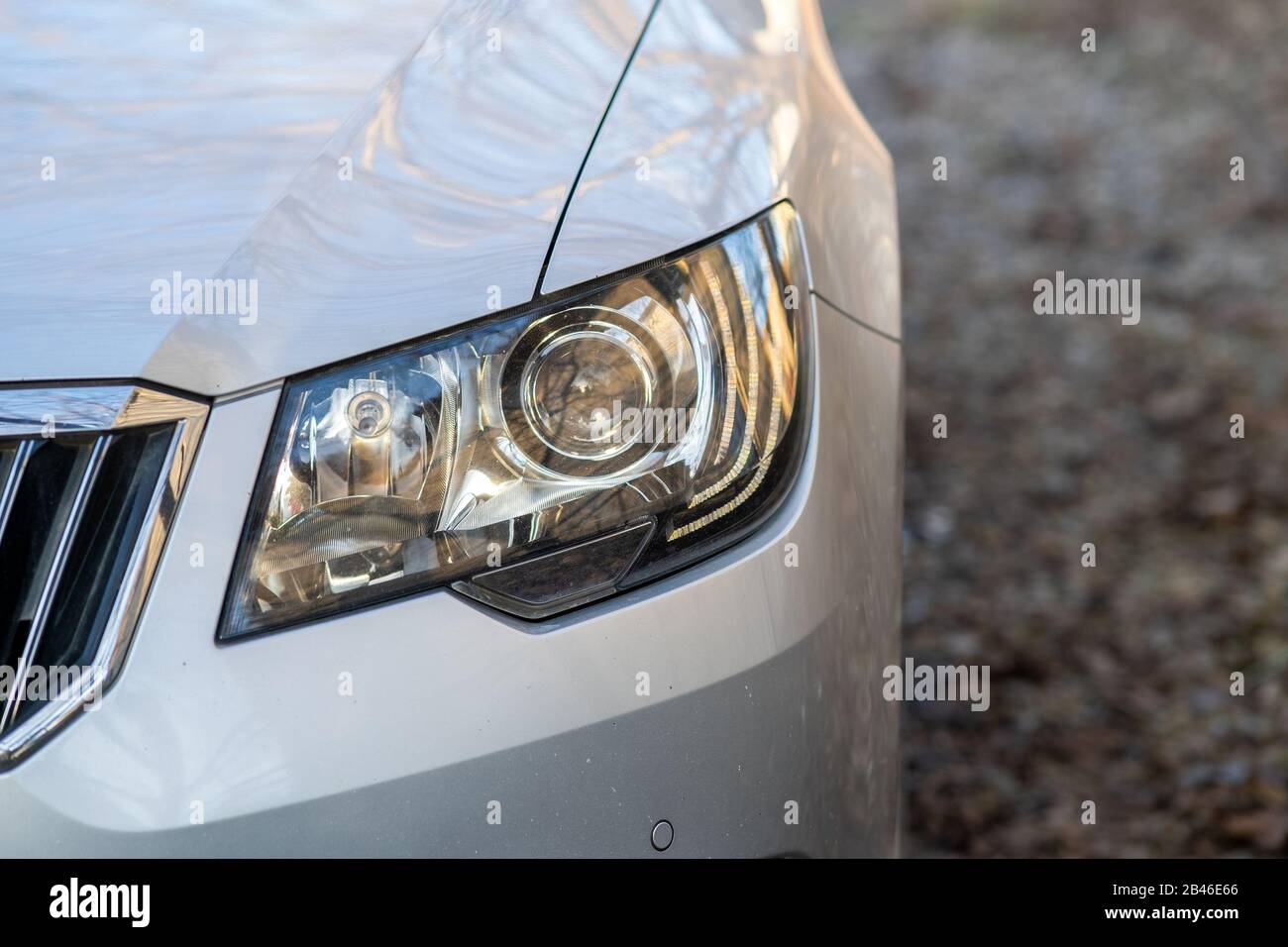 Close up view of modern car headlight with shiny optics Stock Photo - Alamy