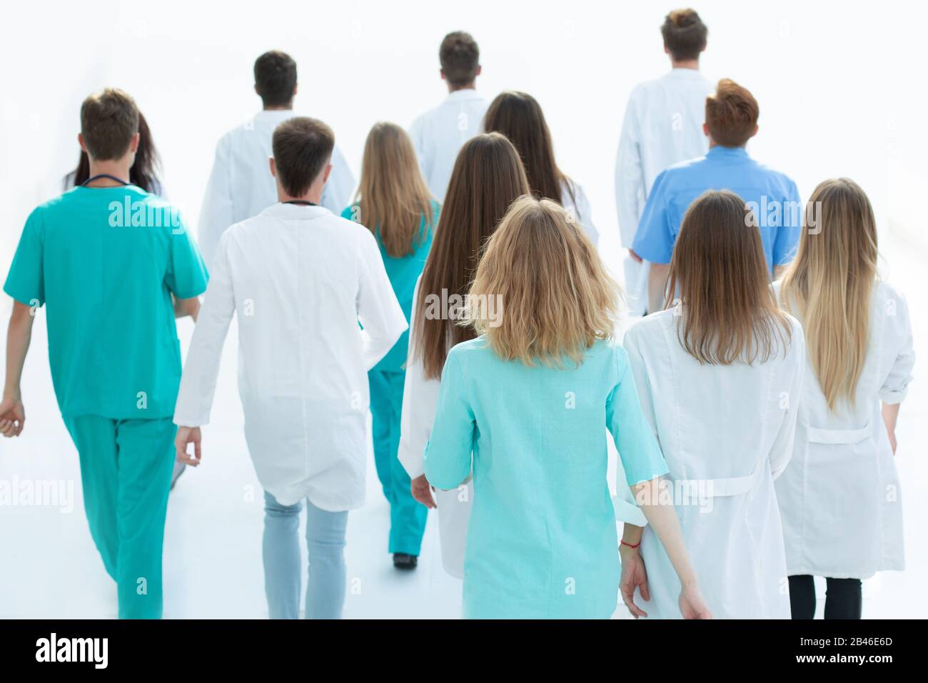 top view. a group of smiling doctors pointing at you Stock Photo - Alamy