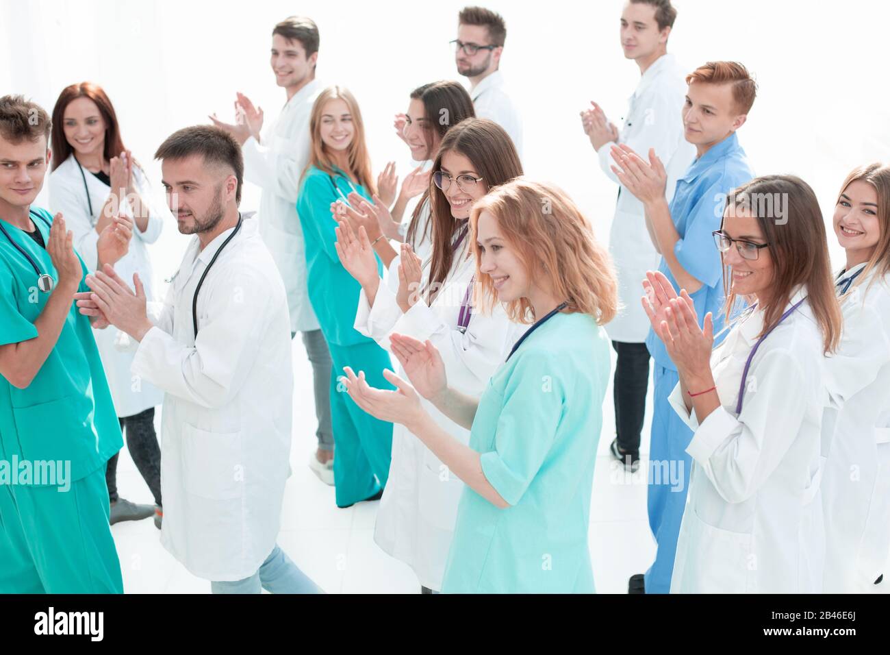 top view. a group of smiling doctors pointing at you Stock Photo - Alamy