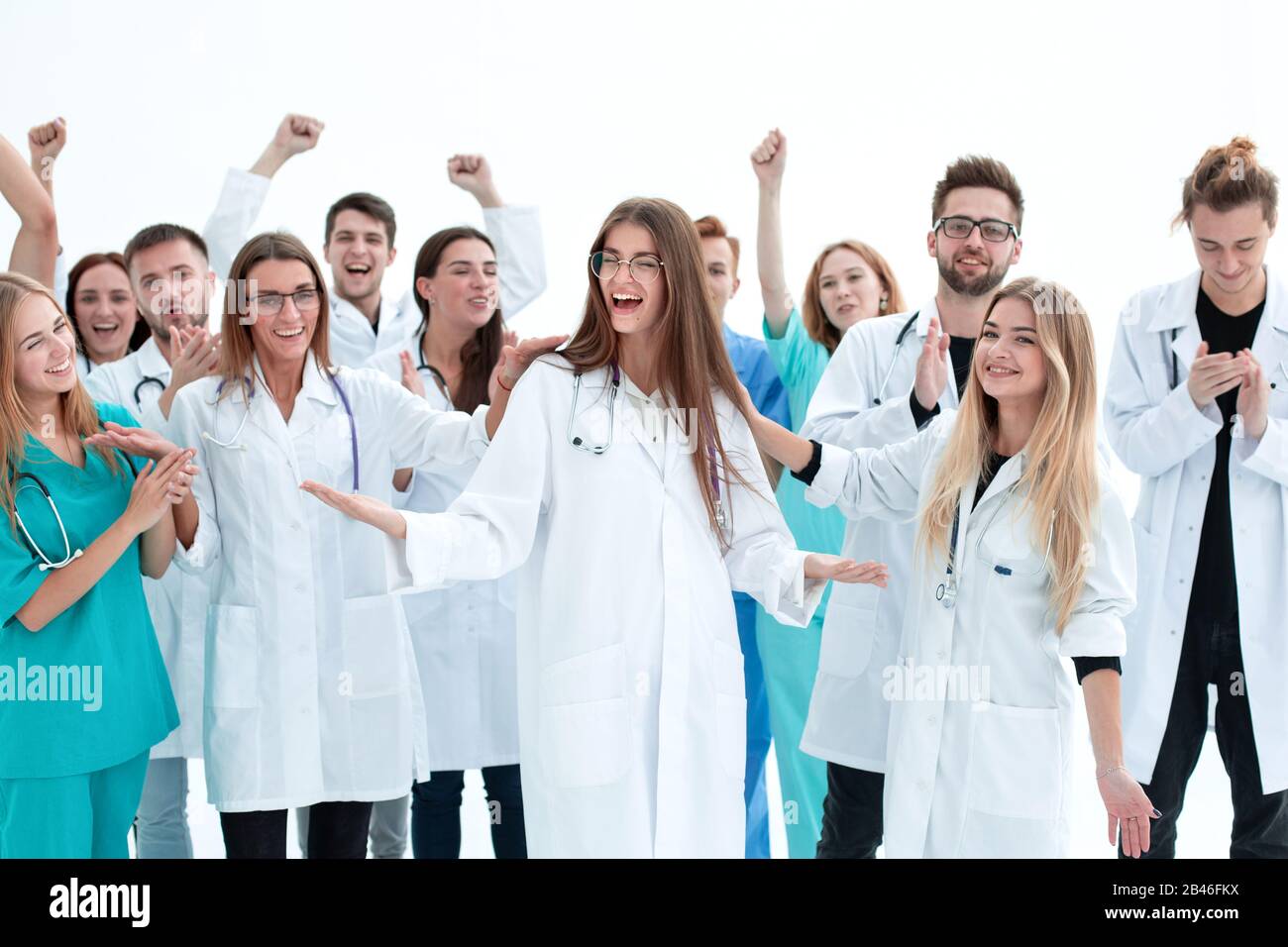 top view. a group of smiling doctors pointing at you Stock Photo - Alamy