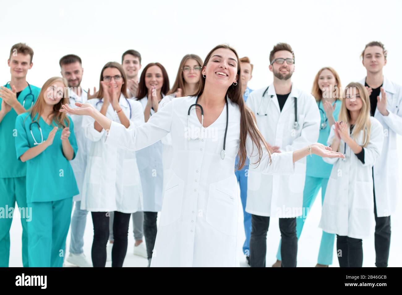 top view. a group of smiling doctors pointing at you Stock Photo - Alamy