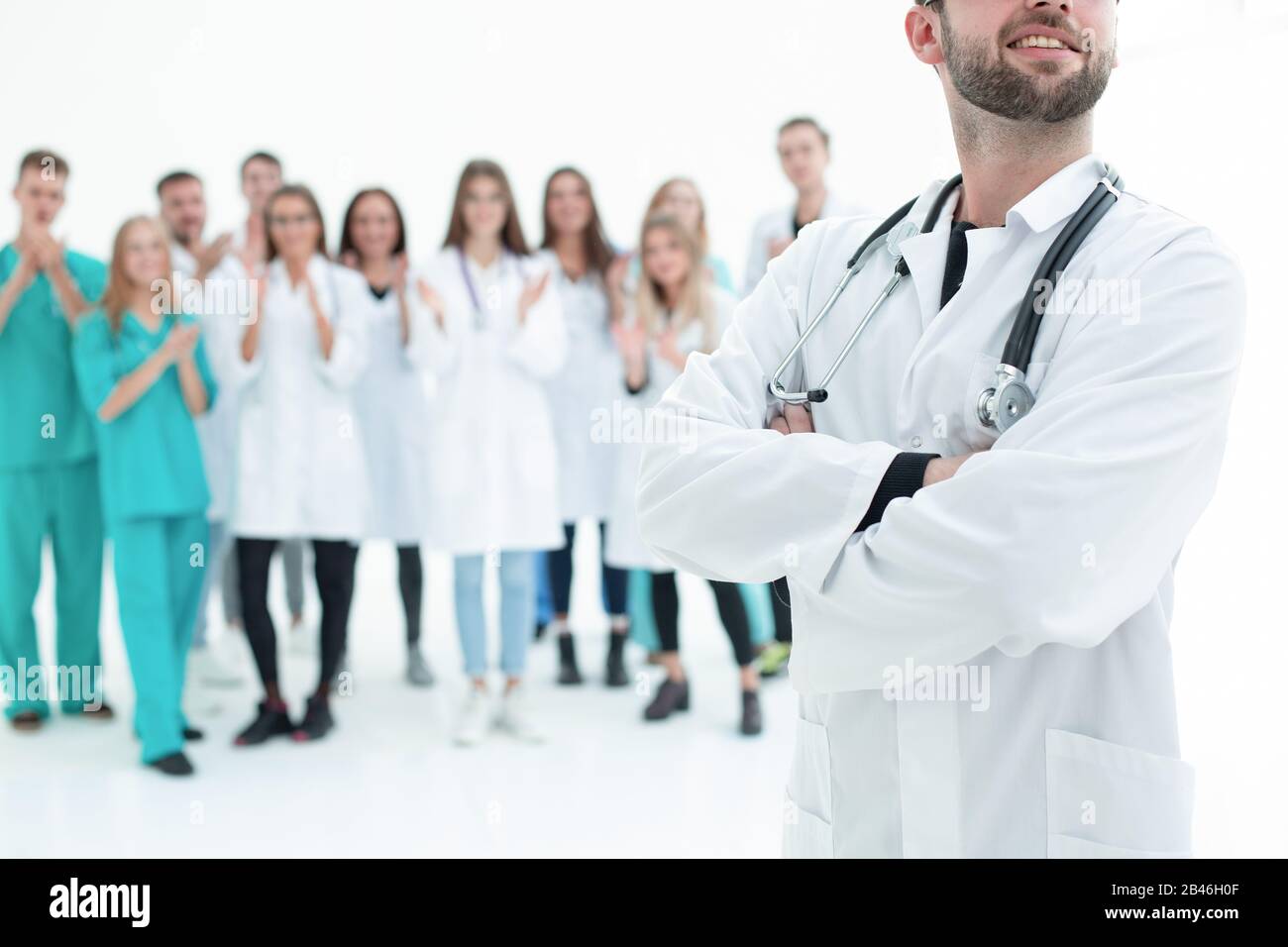 top view. a group of smiling doctors pointing at you Stock Photo - Alamy