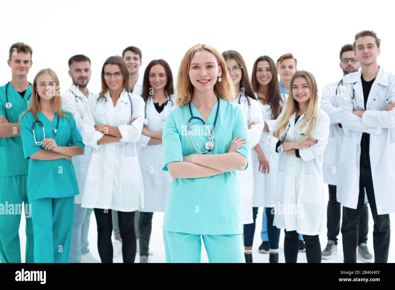 top view. a group of smiling doctors pointing at you Stock Photo - Alamy