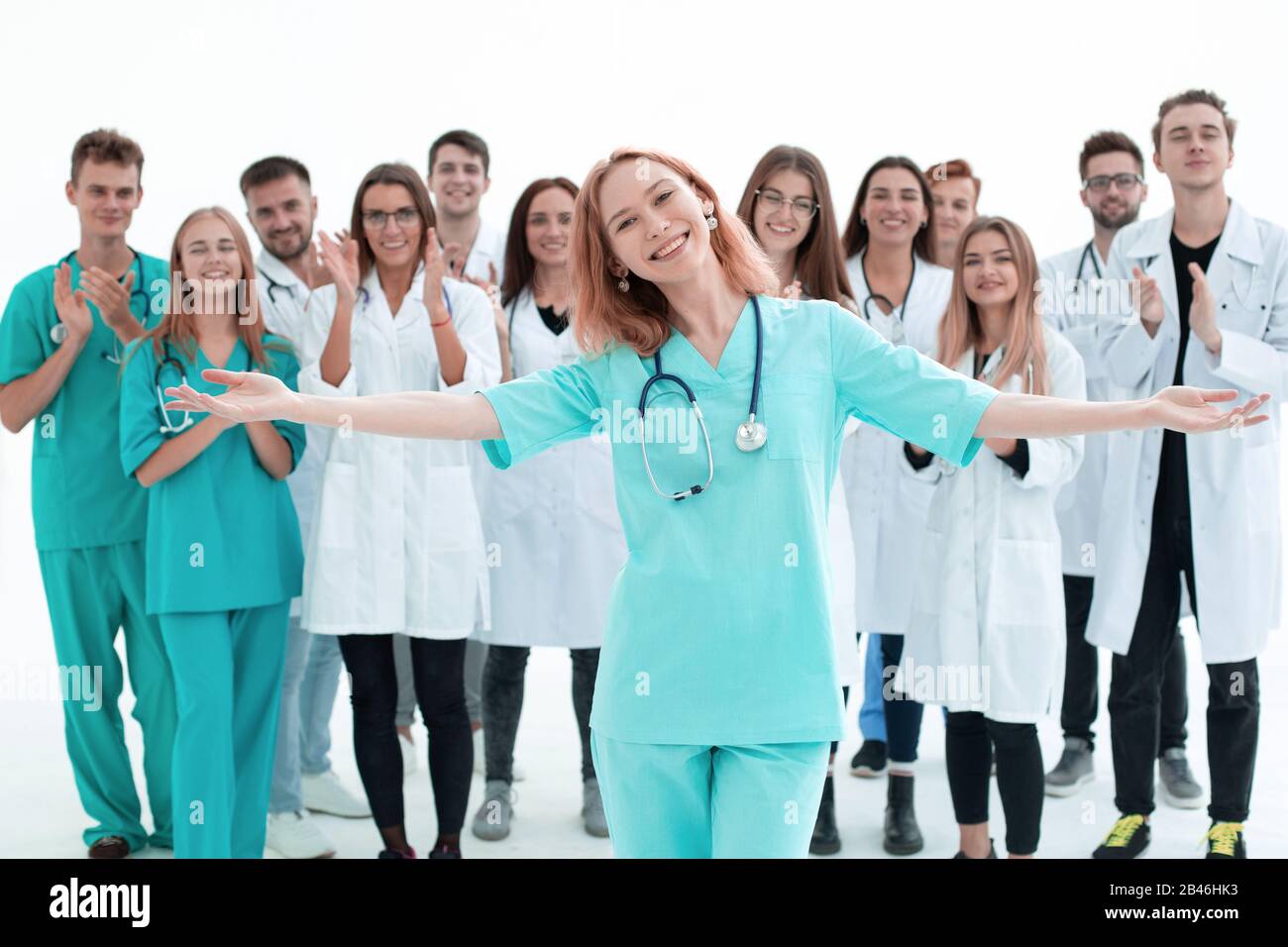 top view. a group of smiling doctors pointing at you Stock Photo - Alamy