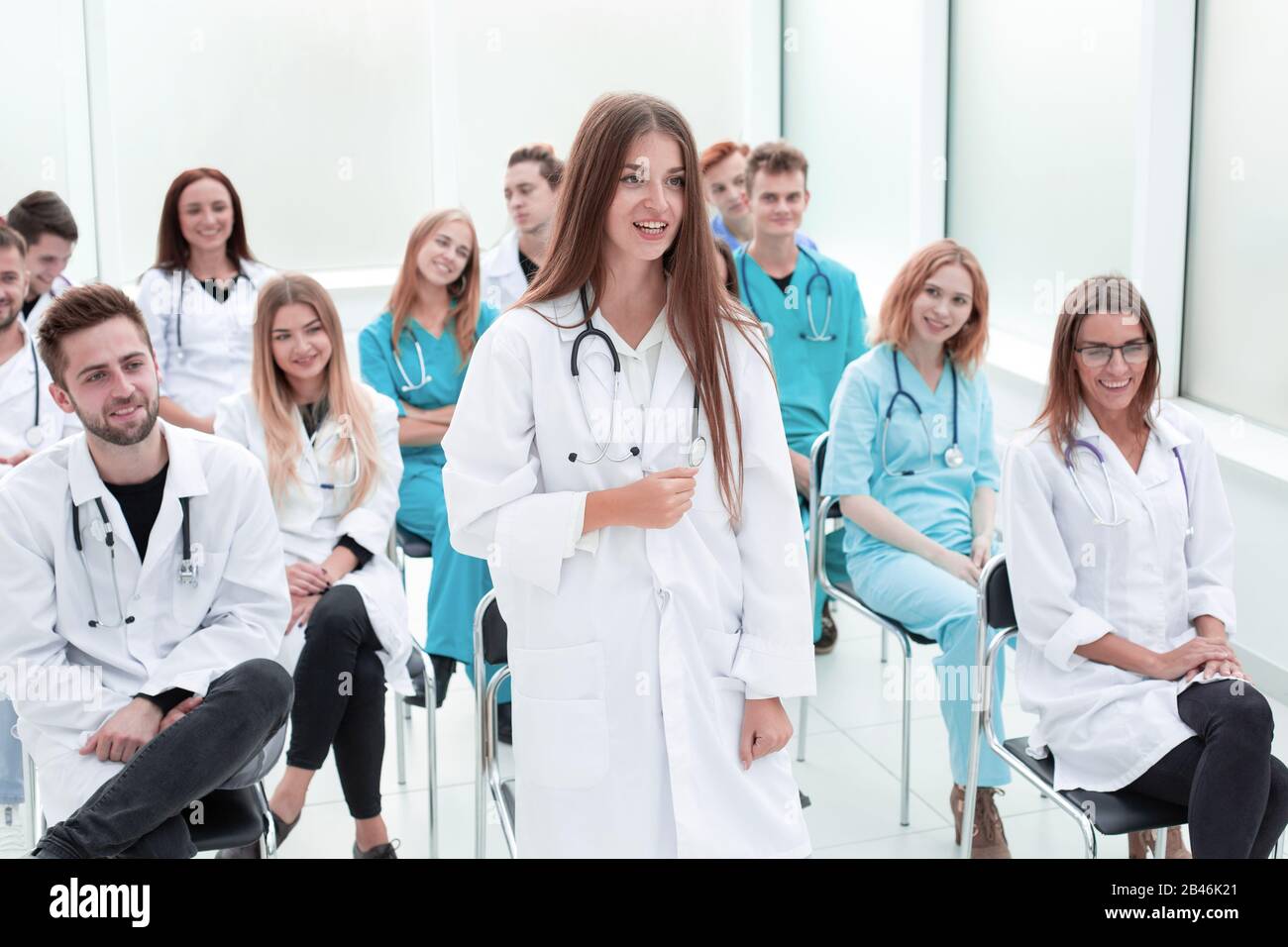 top view. a group of smiling doctors pointing at you Stock Photo - Alamy