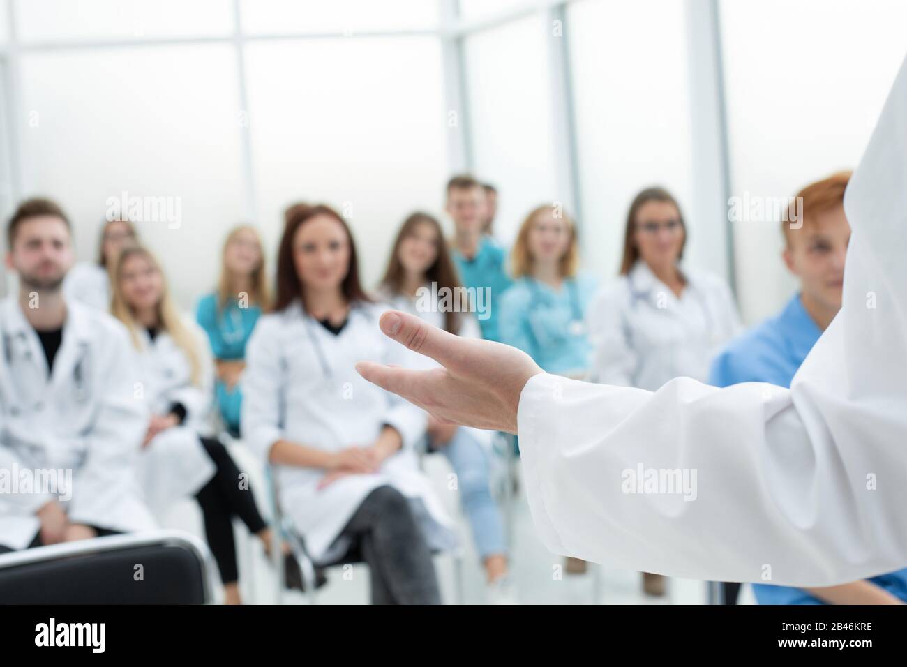top view. a group of smiling doctors pointing at you Stock Photo - Alamy