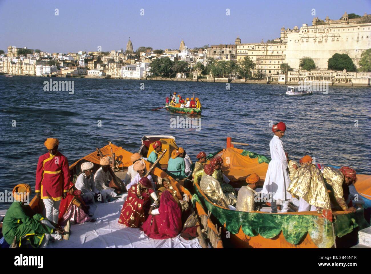 peoples in boat in mewar festival udaipur at rajasthan India, Asia ...